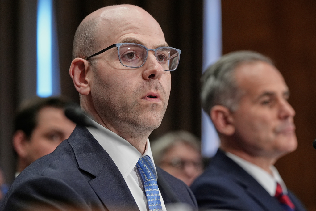 Senate committee approves Trump's Fed Board nominee, raising concerns ...