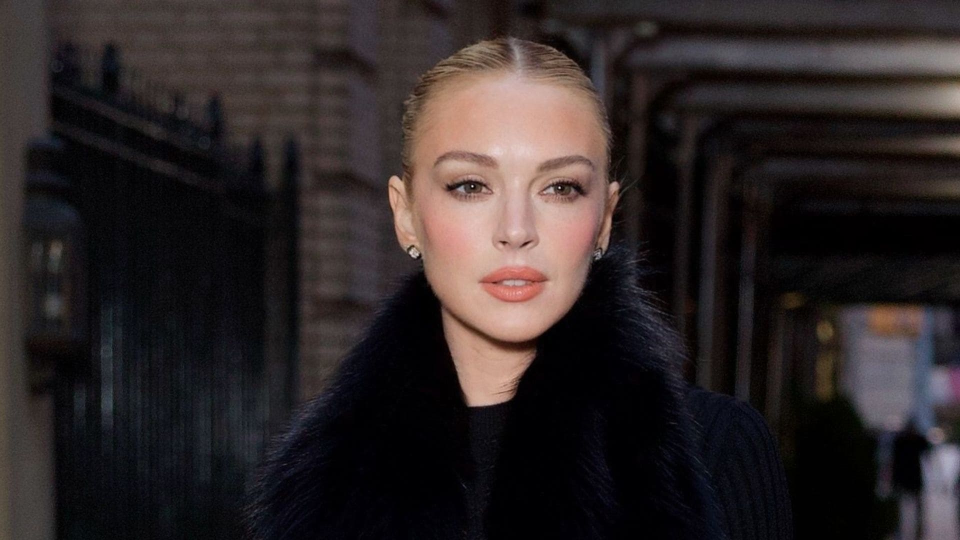 Lindsay Lohan flaunts flawless skin and fur minidress after revealing ...