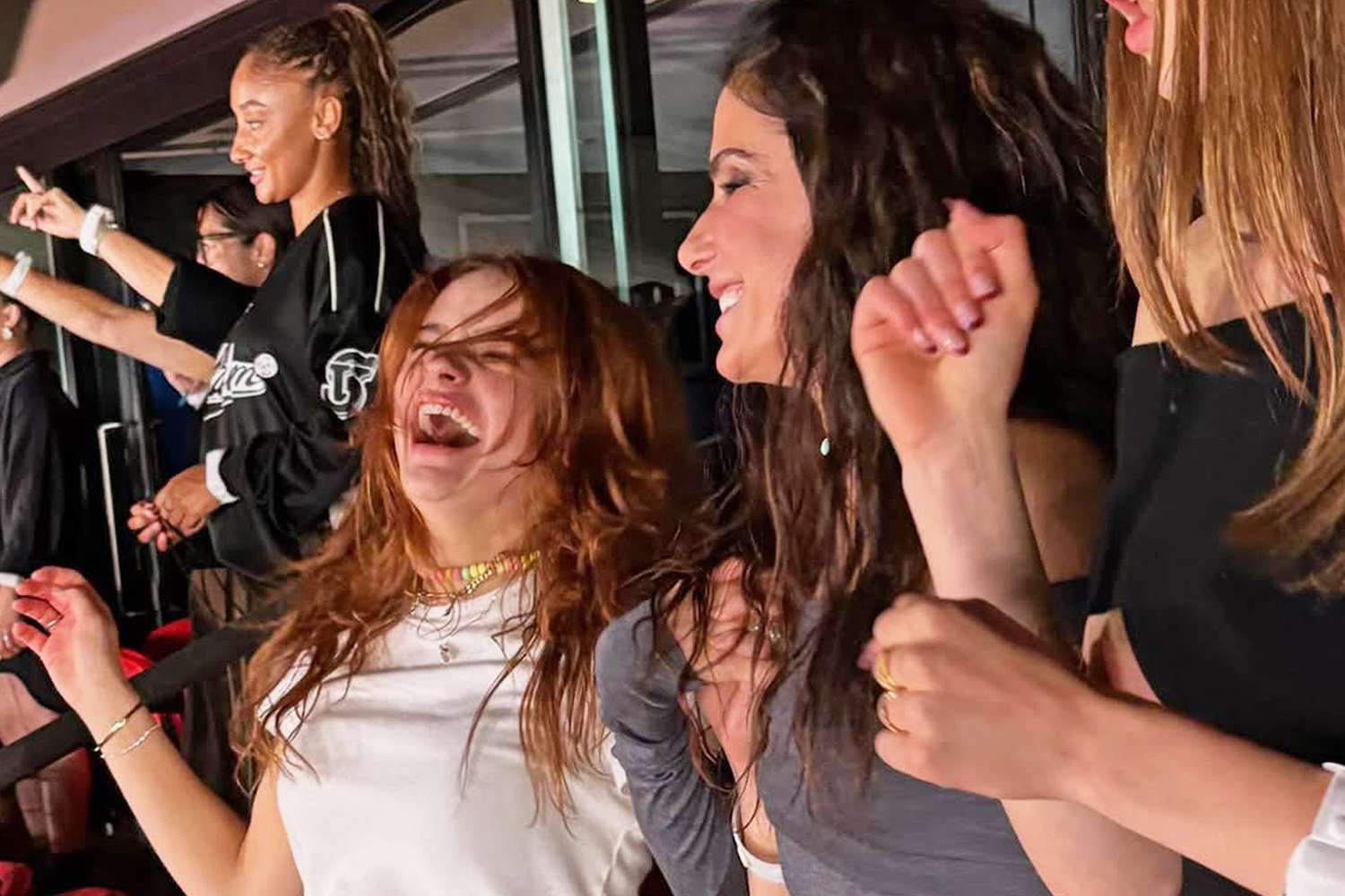 Joey King Rocks Out with Sandra Bullock at Coldplay Concert Between ...