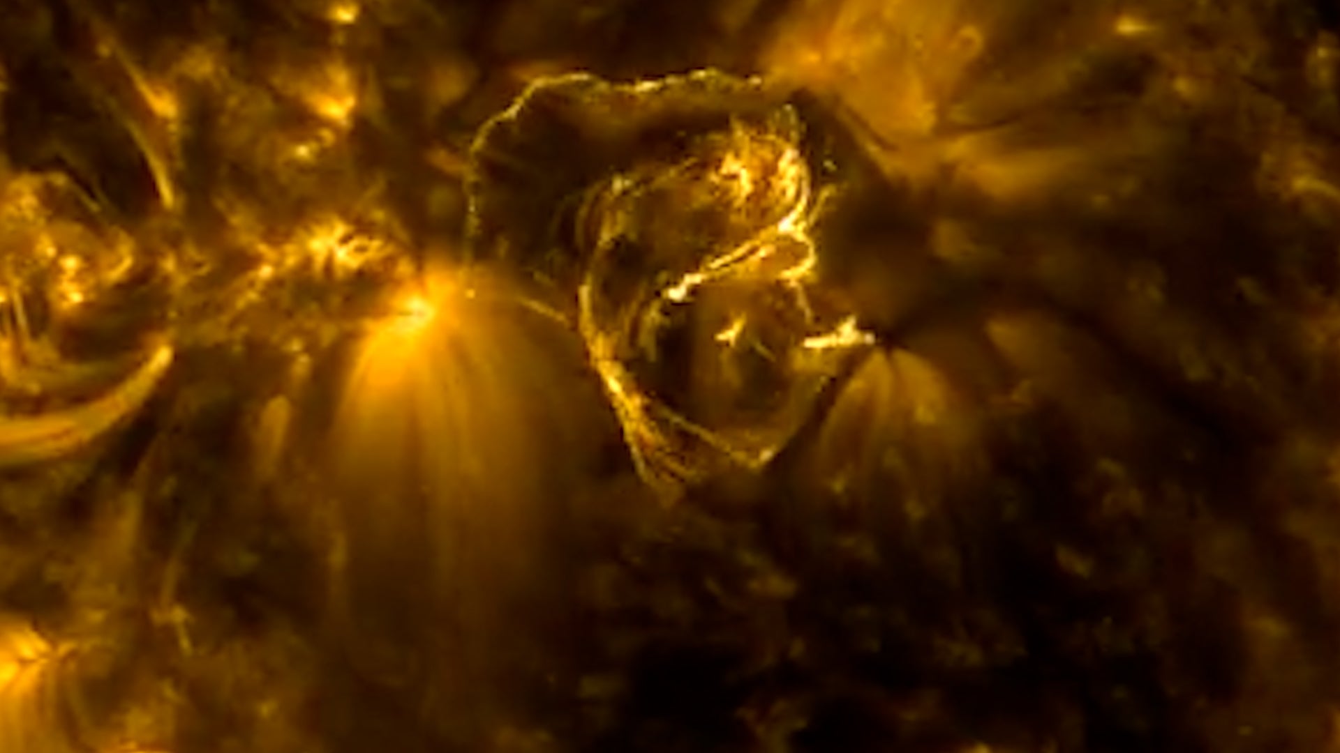 Superman, is that you? What caused 'S' shape on sun