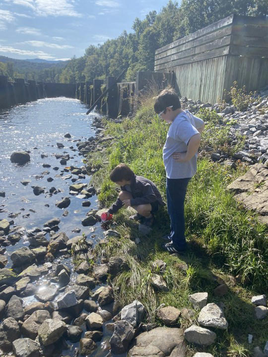 Ashley Academy students raise, release trout fingerlings