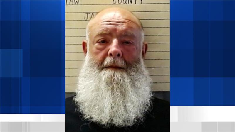 Hugo man arrested for allegedly shooting at neighbor’s house
