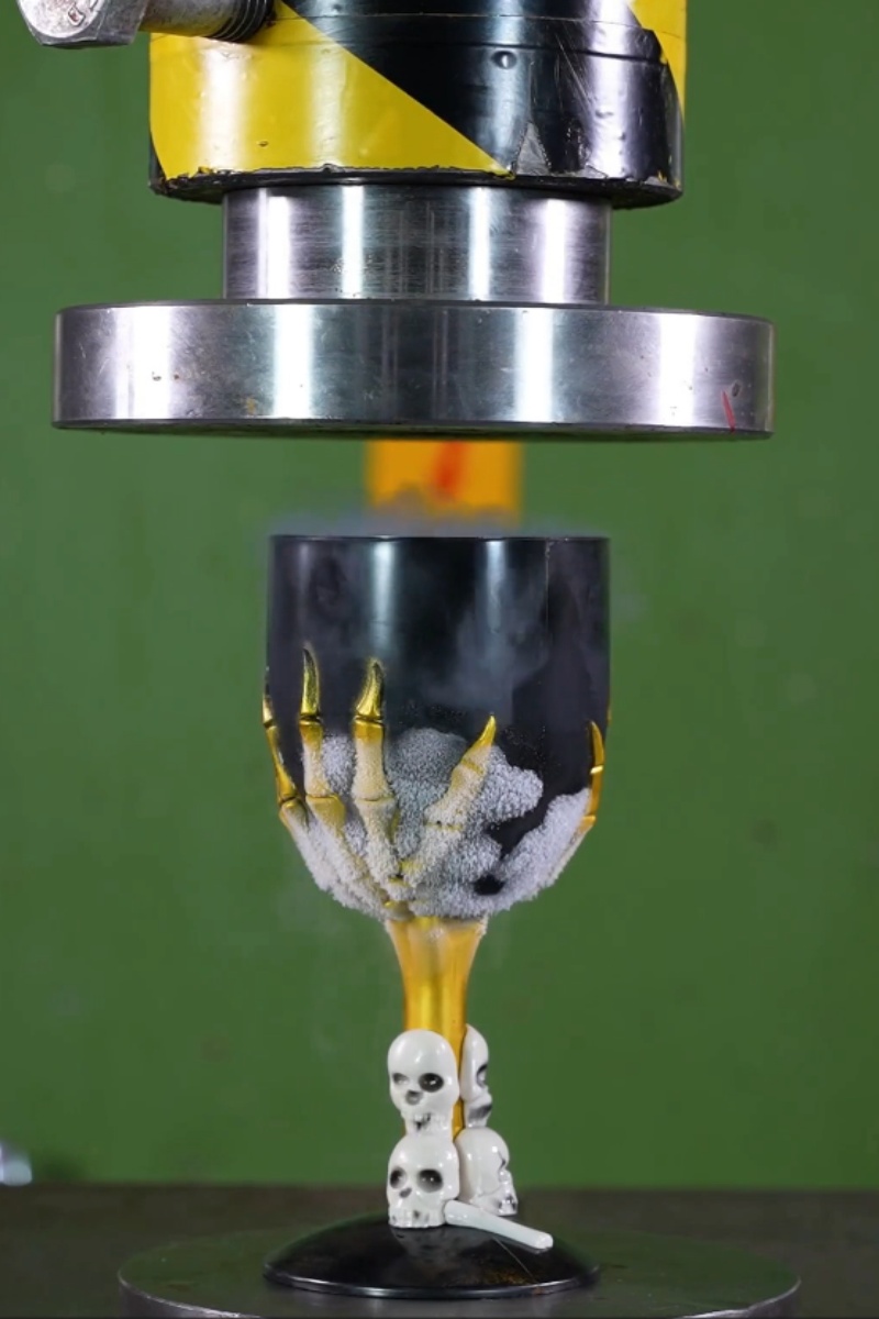 Skull goblet under hydraulic press