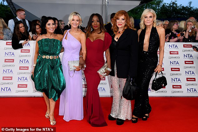 Michelle Collins wows in a black sequinned gown as she joins EastEnders ...