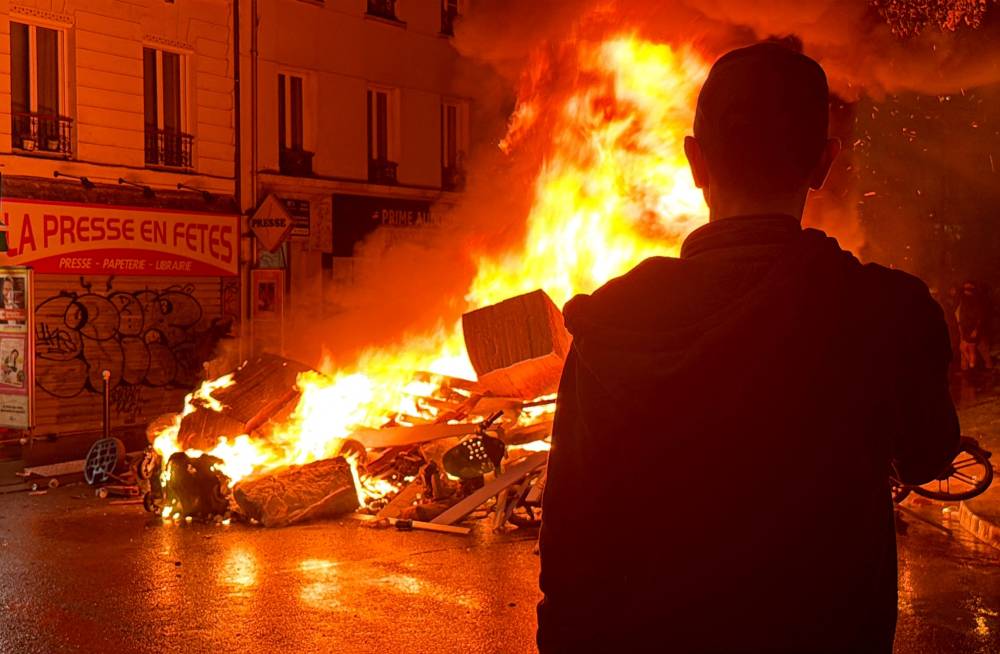 New French PM vows 'profound break' with past as protests flare