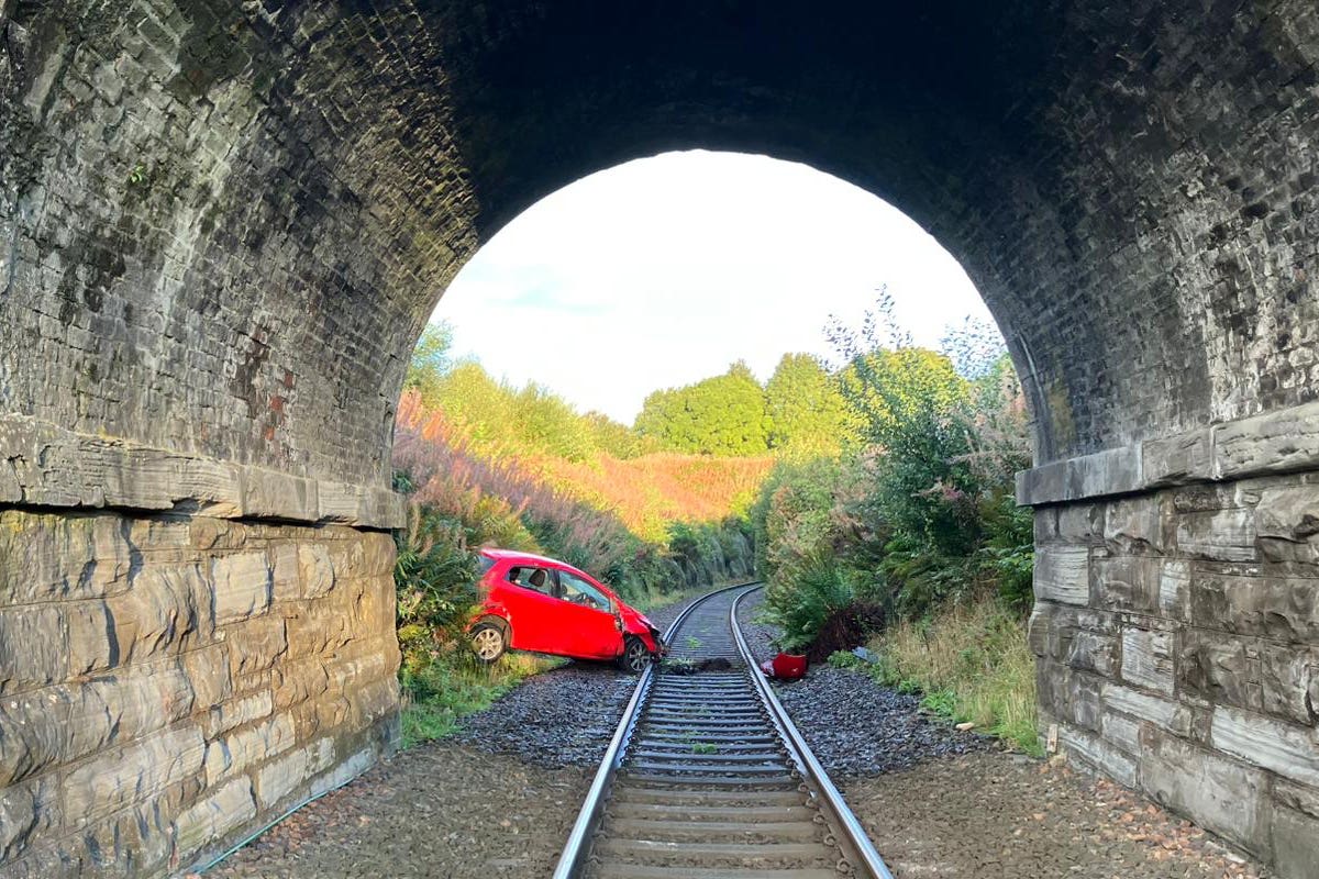 Rail disruption after train crashes on to track