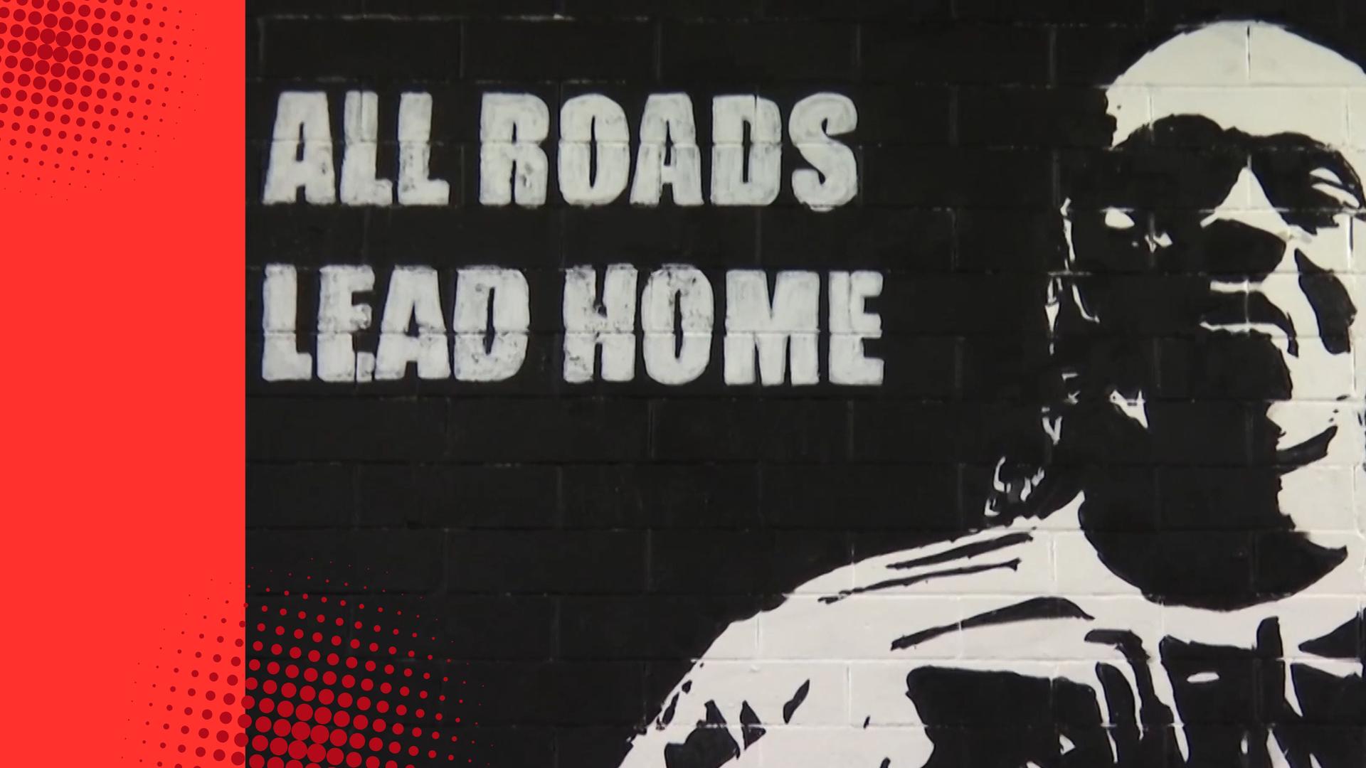 In the dark of the night, Arsenal supporter and street artist ...