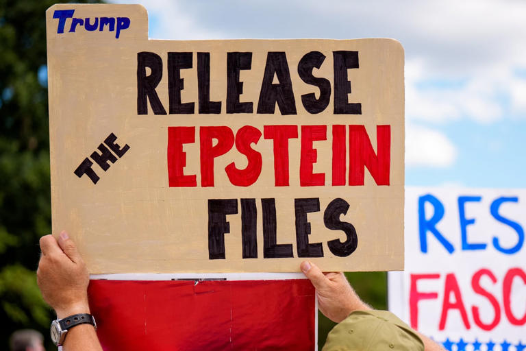 Trump threatens to sue New York Times over "malicious" reporting on ...