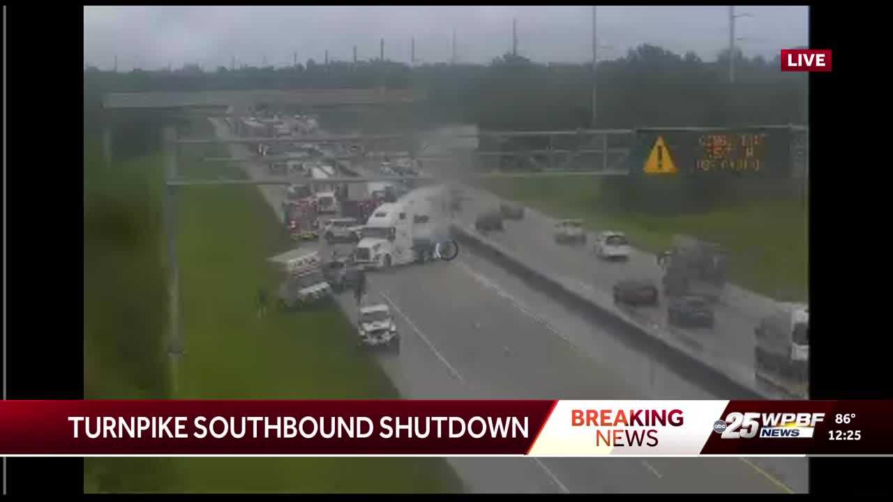 Turnpike traffic halted by jackknifed tractor-trailer and car crash
