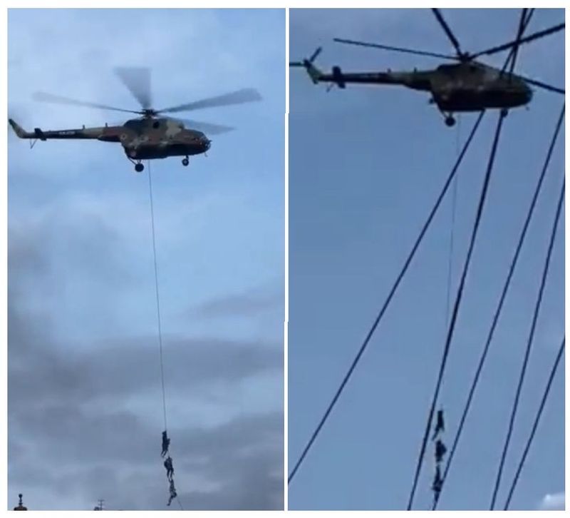 Video: Nepal ministers, family flee clinging to rope on helicopter as ...
