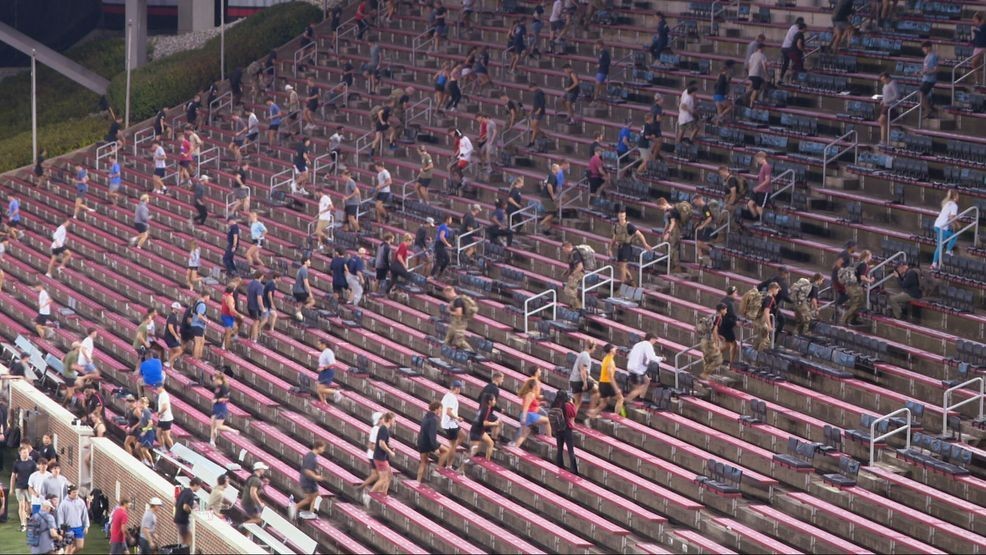 'You have to honor those people': Hundreds run 2,071 steps at UC in 9/ ...