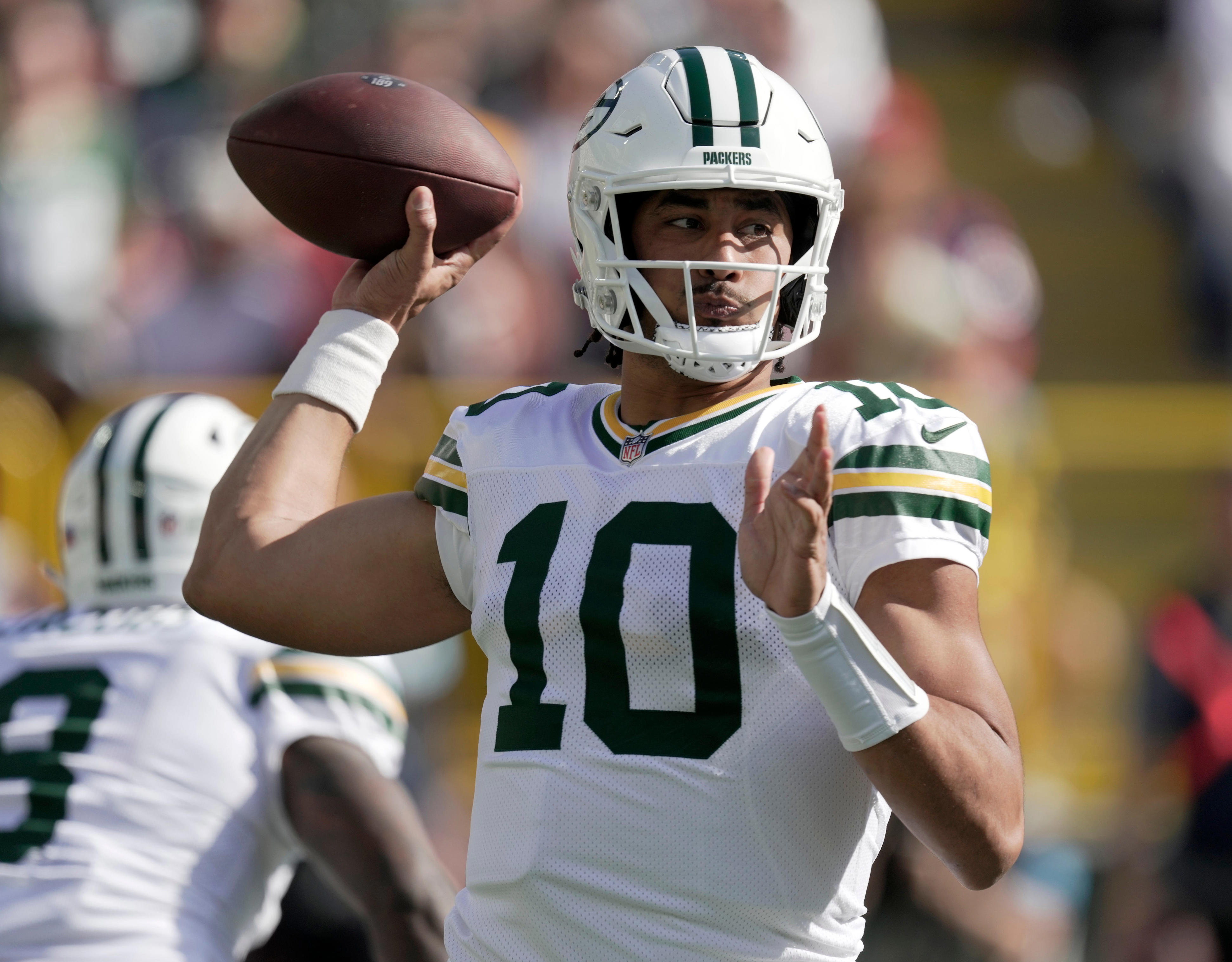 Why are the Packers wearing all-white uniforms on TNF?