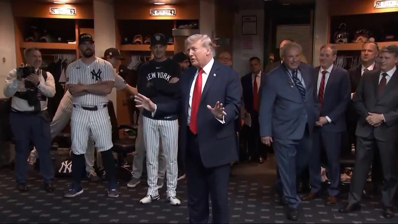 Trump draws cheers and boos while marking 9/11 by attending a New York ...