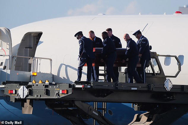 Powerful moment Charlie Kirk's widow Erika holds hands with Usha Vance on Air Force 2