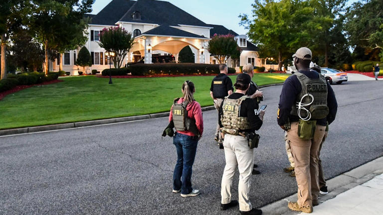 Stolen name, stolen benefits: Details on alleged cult, FBI raid on mansion