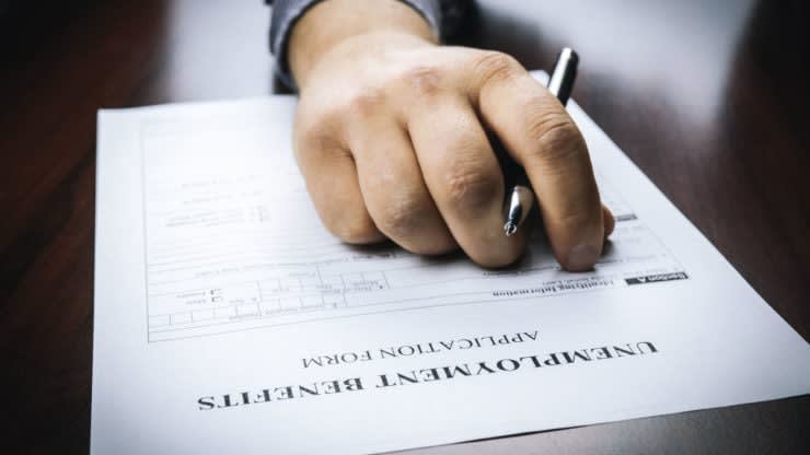 US jobless claims surge to pandemic-era levels, fueling Fed rate-cut ...