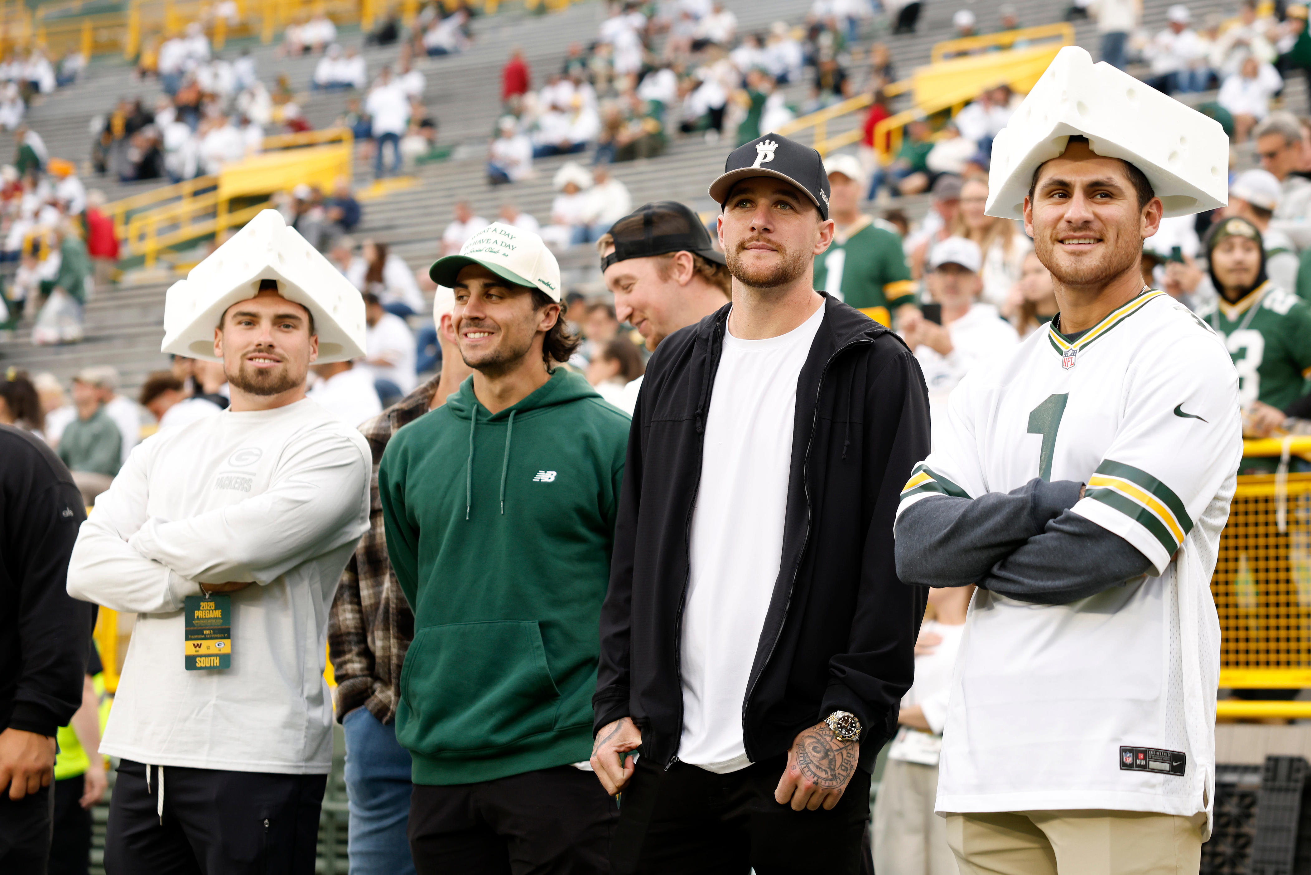 Members of the Milwaukee Brewers show up to the Packers game at Lambeau ...