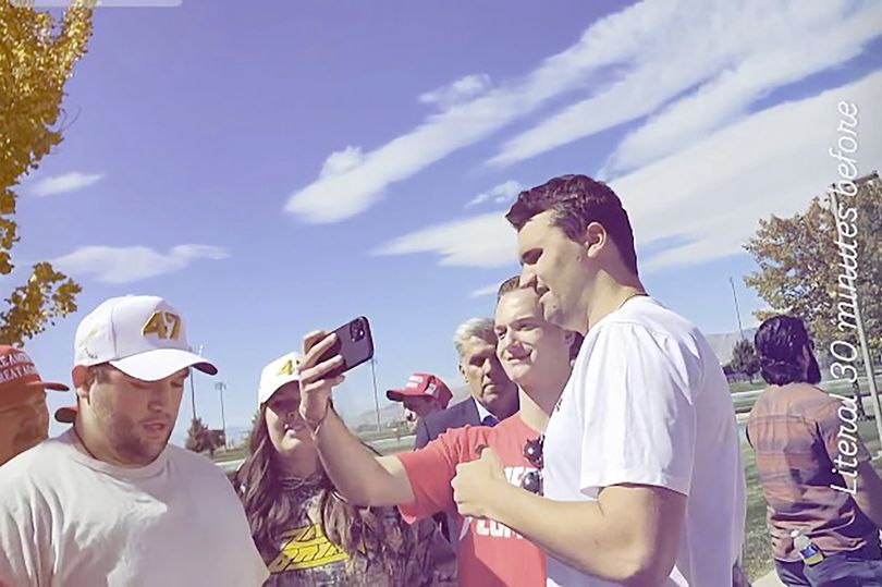 Charlie Kirk seen smiling and taking selfies with fans minutes before ...