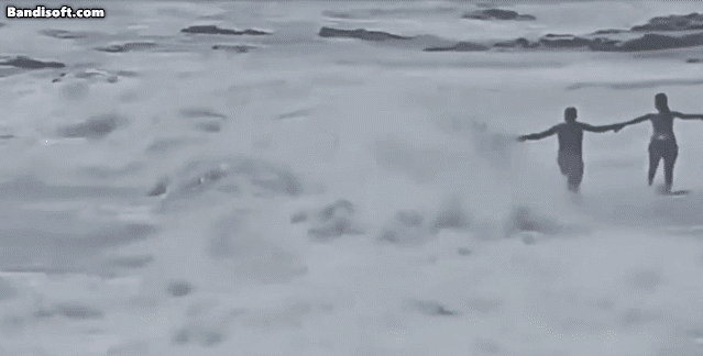 Human chain rescues 6-year-old swept away in Spain