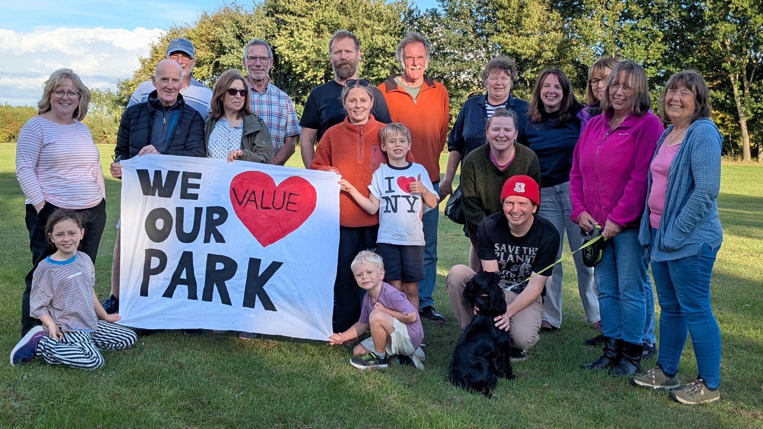 Residents rally to save community park from sale