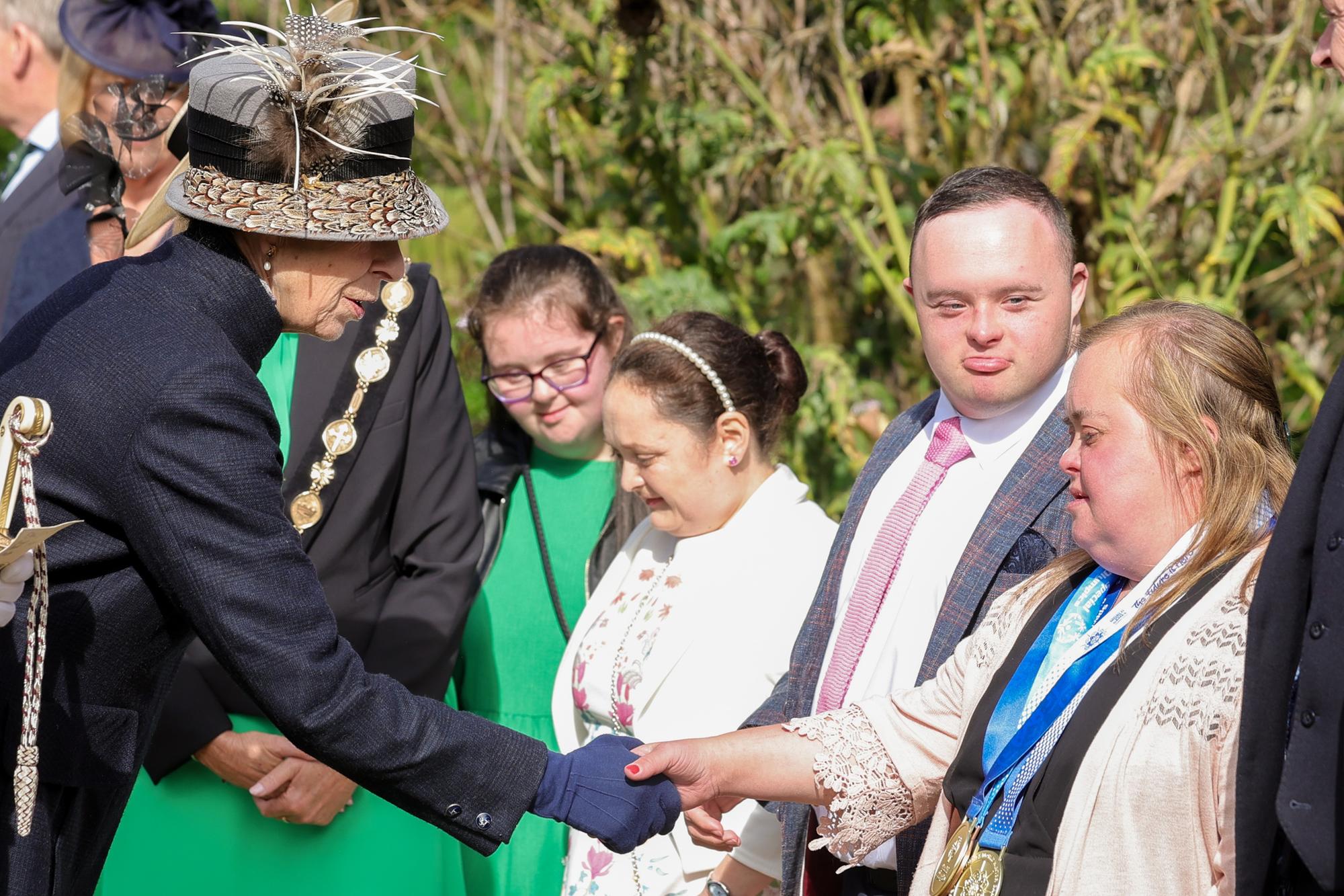 In pictures: Princess Anne greets special guests at Hillsborough Castle ...
