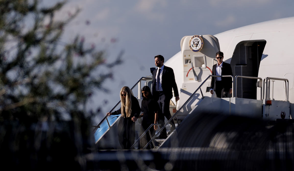Charlie Kirk’s widow Erika holds hands with Usha Vance on his final ...