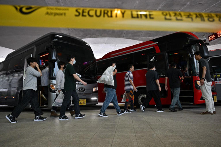 More than 300 South Korean workers return home after US immigration raid
