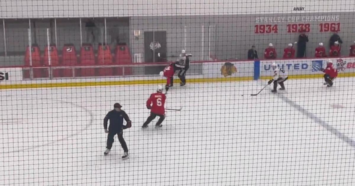 Blackhawks’ rookie AJ Spellacy gets cut in the face by a skate training ...
