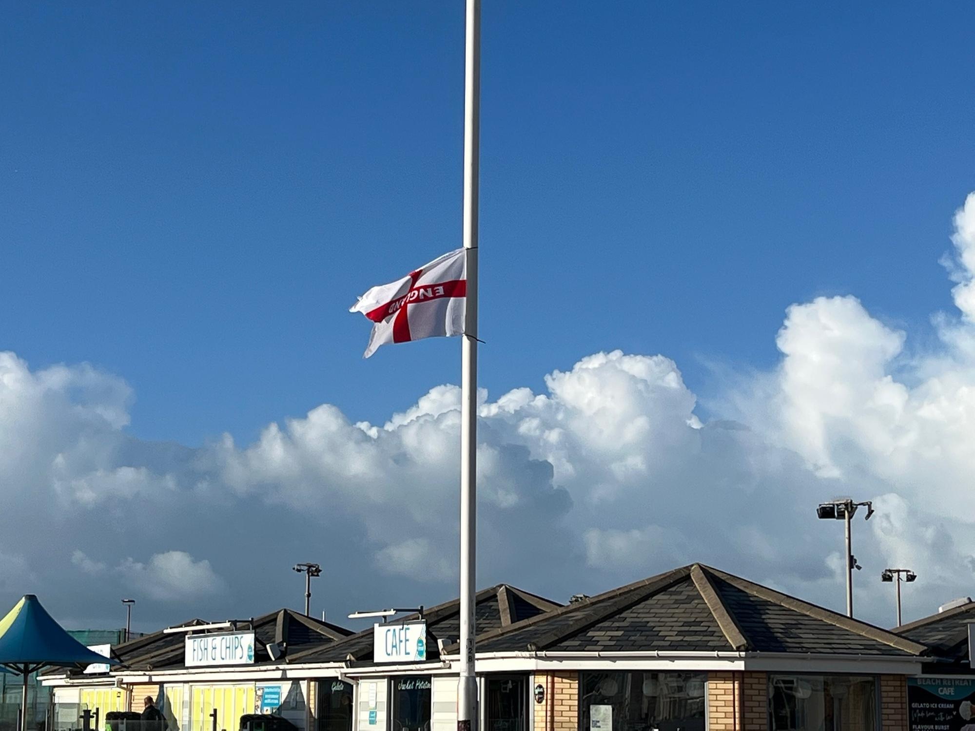 St George's flags appear on lampposts along Hastings seafront