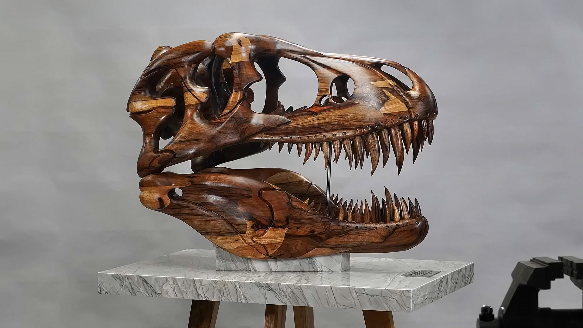I carved a life-size T rex skull from wood 🦖