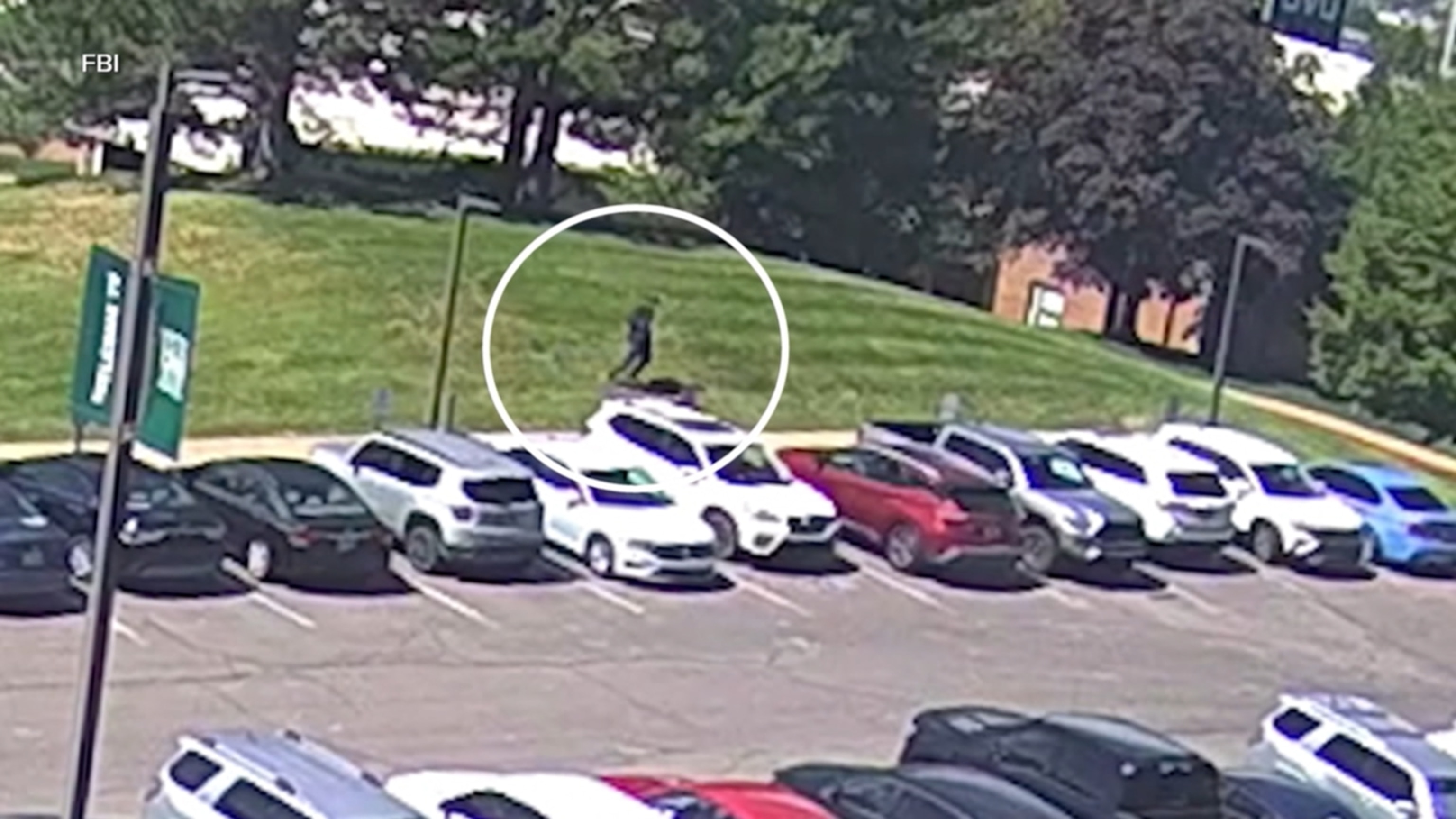 New video released shows alleged Charlie Kirk killer fleeing
