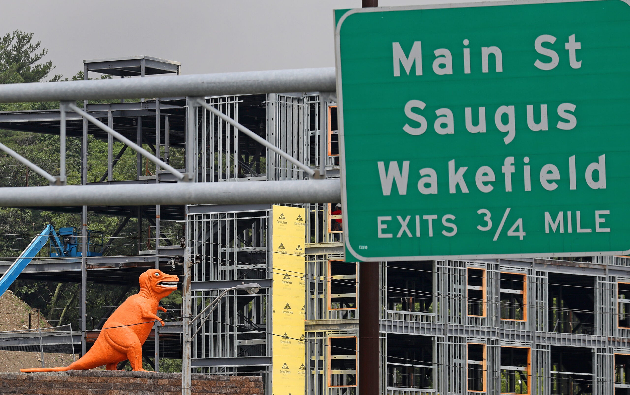 The owners of the orange dinosaur are suing Saugus. Here’s why.