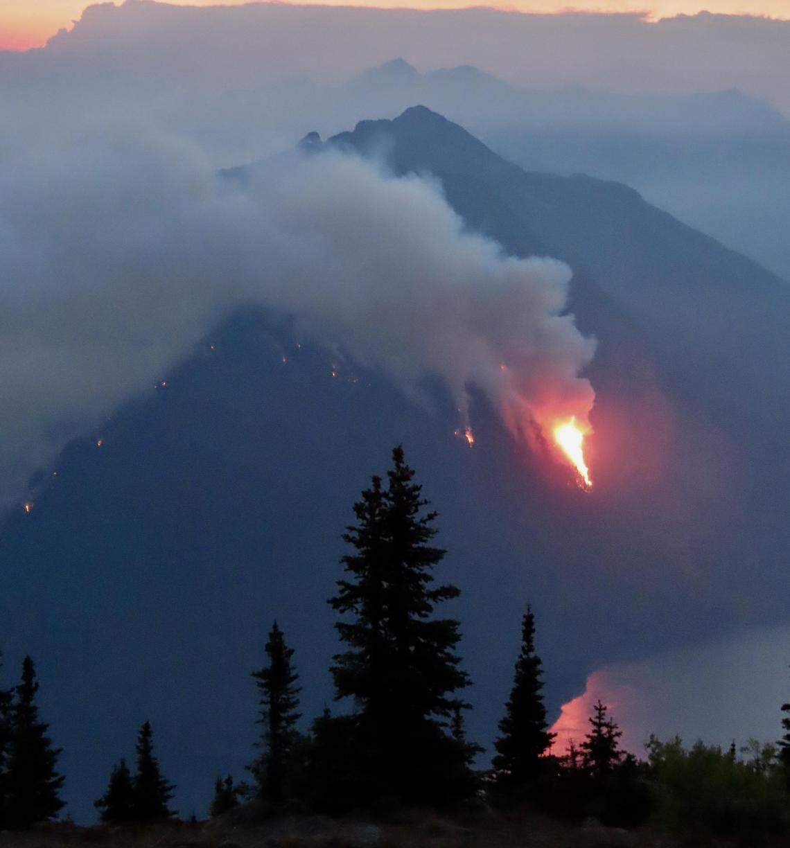 Fire crews protect Whatcom County buildings from growing Perry Fire