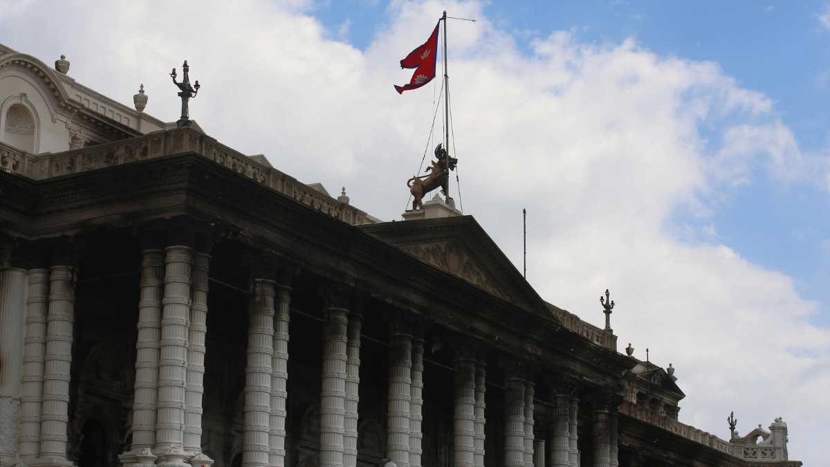 Snapshots of historic Singha Durbar, seat of power in Nepal, bruised by ...