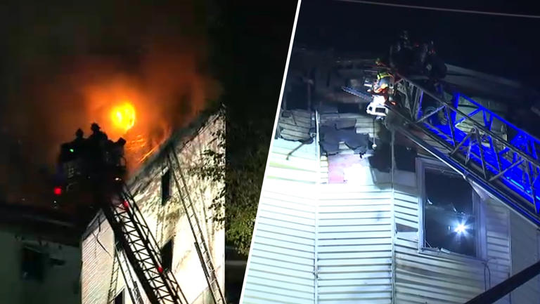 Flames seen in large Manchester, NH, house fire