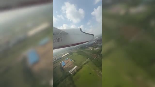 Wheel filmed falling off plane during takeoff as airport declares emergency