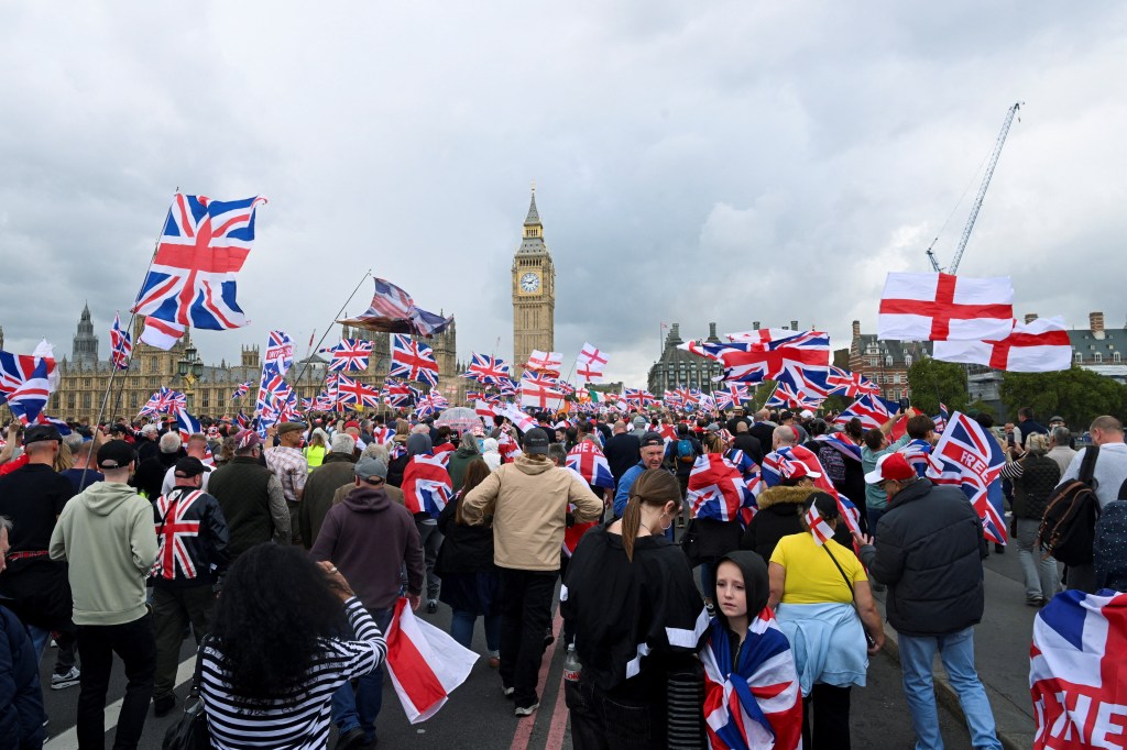Thousands of protesters swarm London for anti-immigration march and ...
