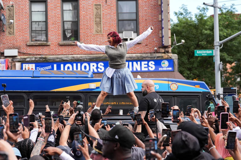Cardi B dances on top of car during pop-up event ahead of new album release