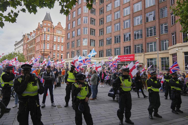 At least 25 protesters arrested for assaulting police officers in ...