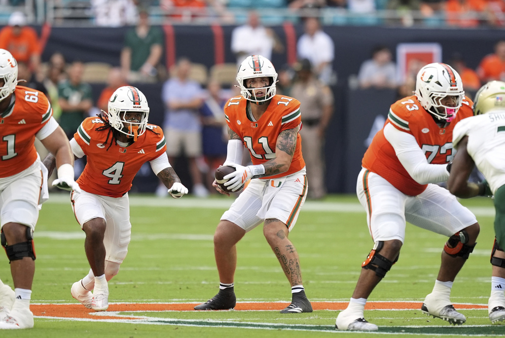 USF's Byrum Brown, Miami's Carson Beck each intercepted, ending long streaks without a pick