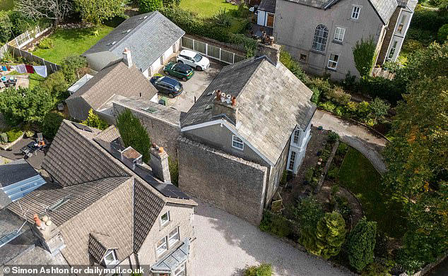 How homeowner went to war with neighbour nextdoor after building 20ft ...