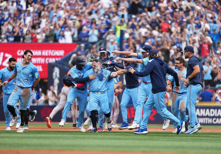Instant Reaction: Blue Jays score three runs in the ninth to come back ...