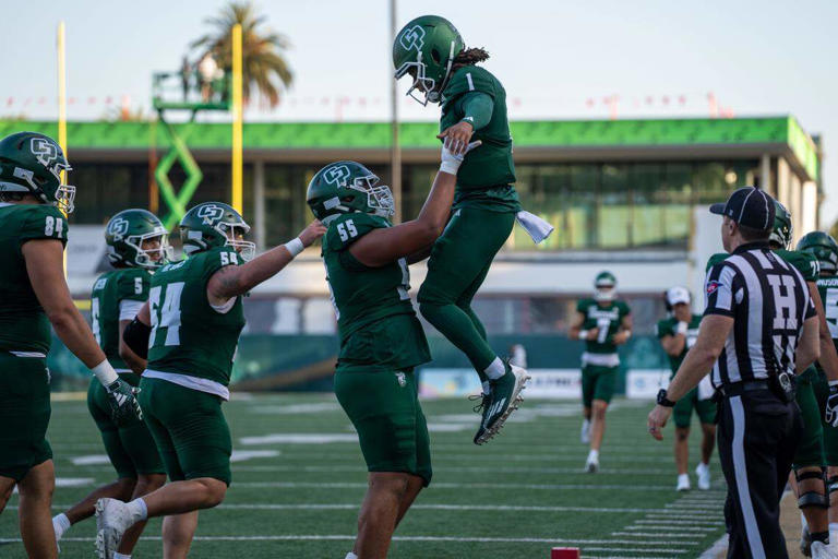 Cal Poly runs up a 56-7 win before packed house at its home opener