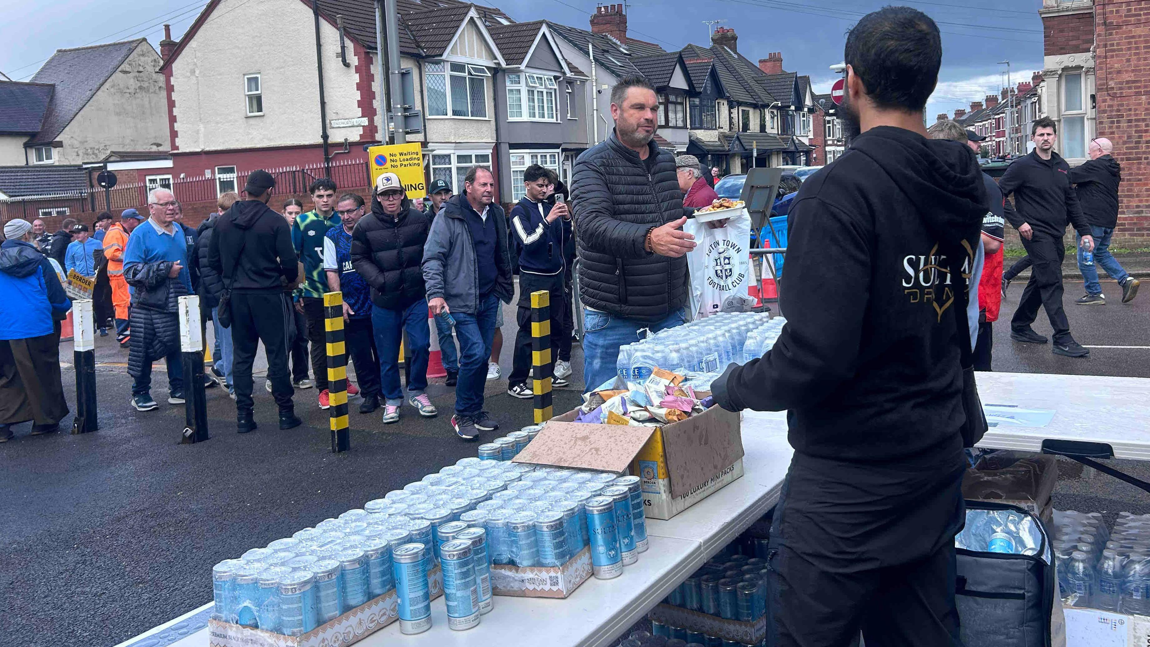 Mosque gives out refreshments at club celebration