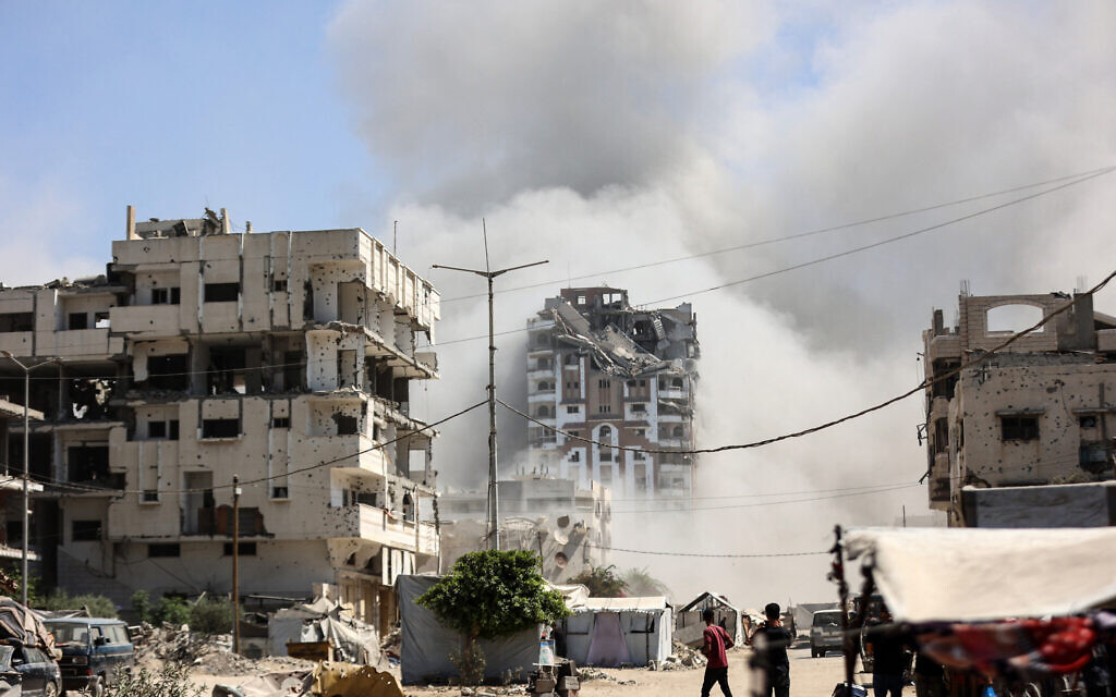 Israel levels three towers in Gaza City as residents continue to ...
