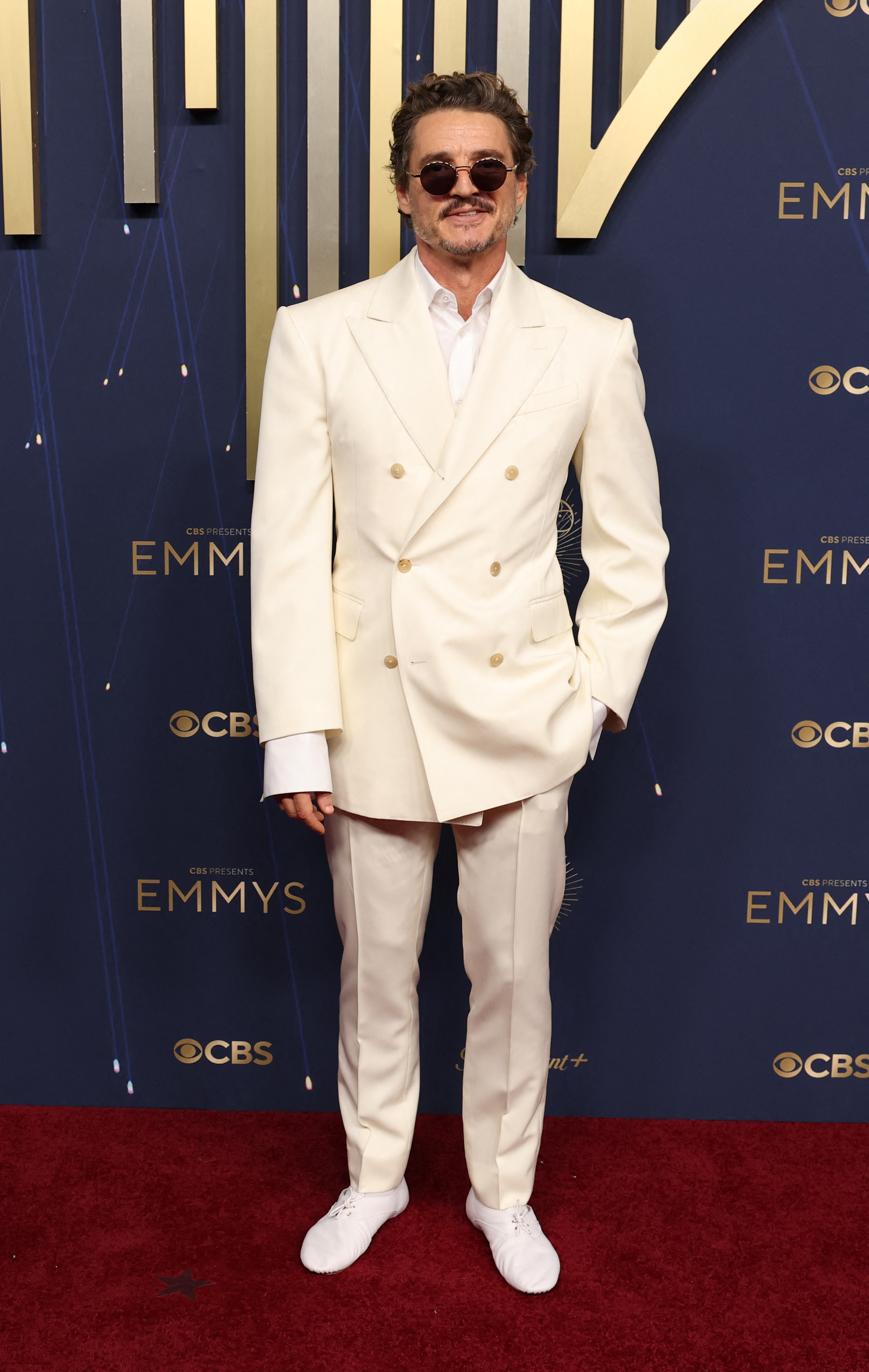 Pedro Pascal looks sharp in head-to-toe white on Emmys 2025 red carpet