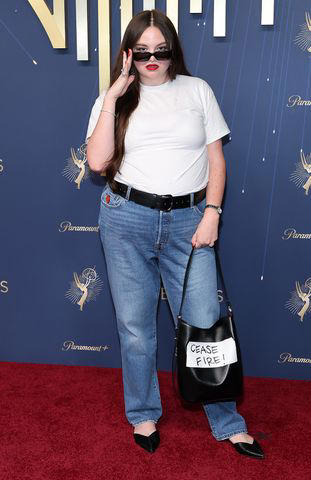 Meg Stalter Breaks Formal Dress Code in Blue Jeans and a T-Shirt at ...