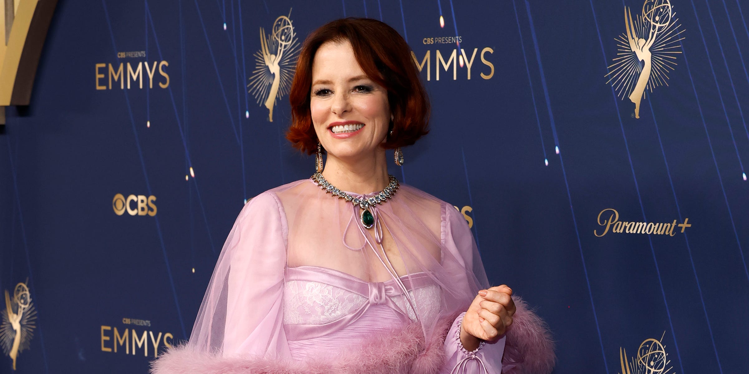 Parker Posey Makes Her Emmys Debut in Ruffled Pink Valentino Gown