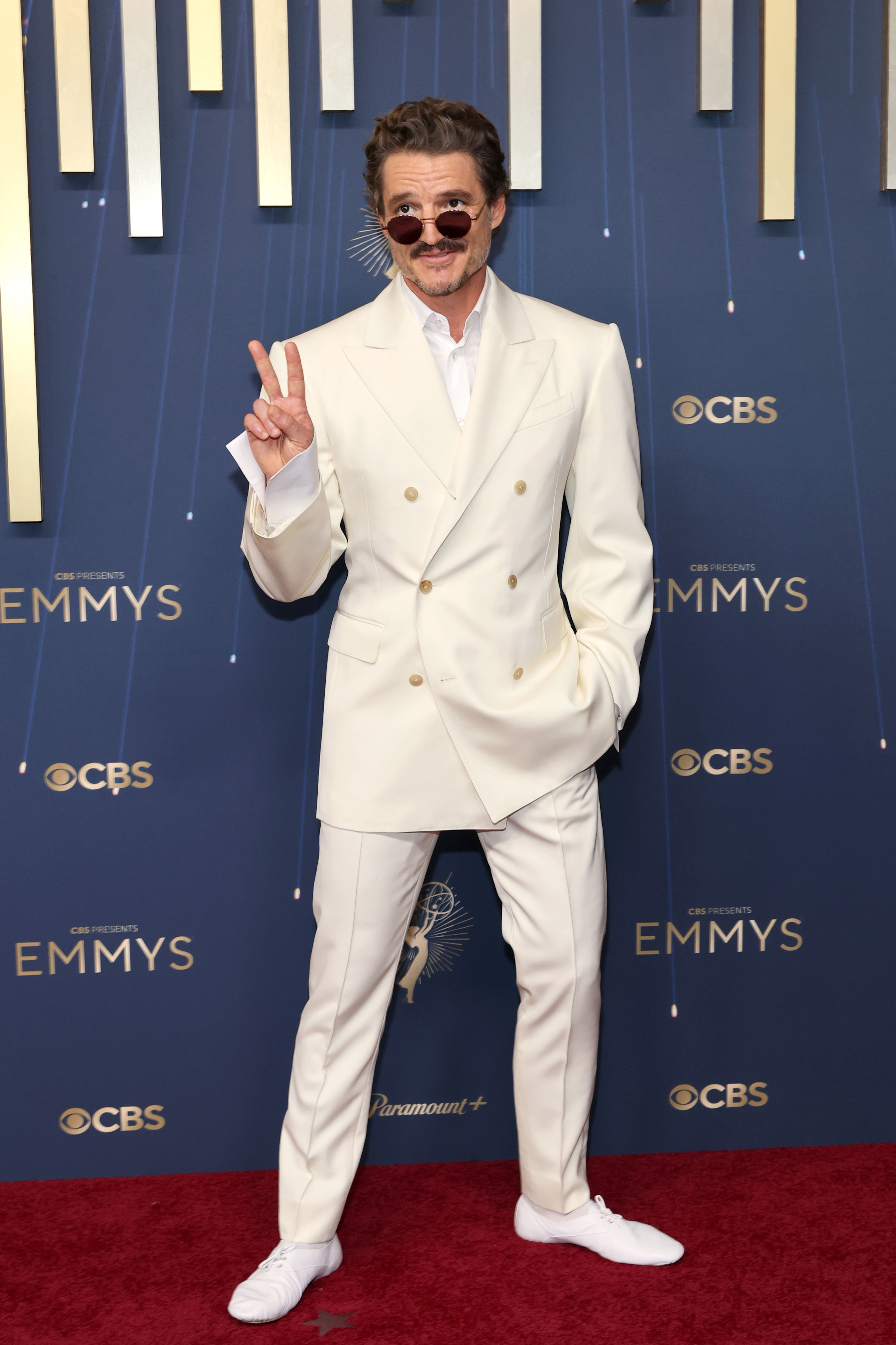 Pedro Pascal looks sharp in head-to-toe white on Emmys 2025 red carpet