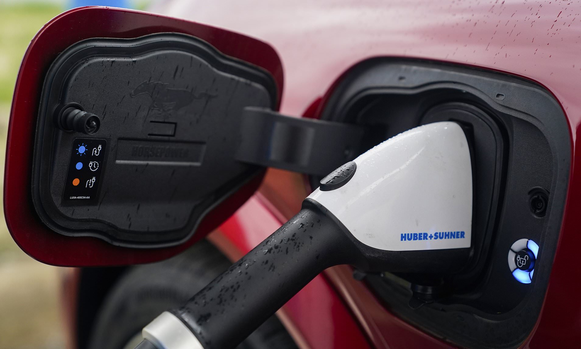 Oil giant says new liquid solution can cut electric car charging times ...